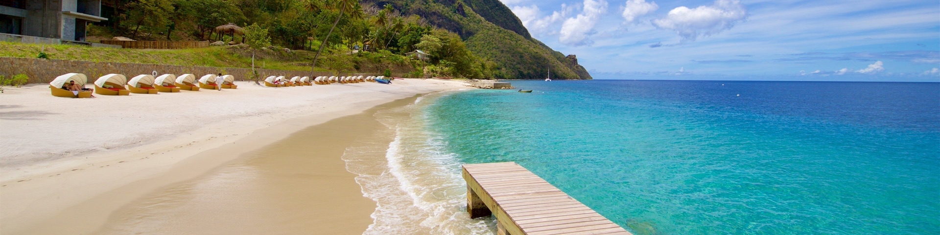 Jalousie Beach which includes mountains, tropical scenes and general coastal views