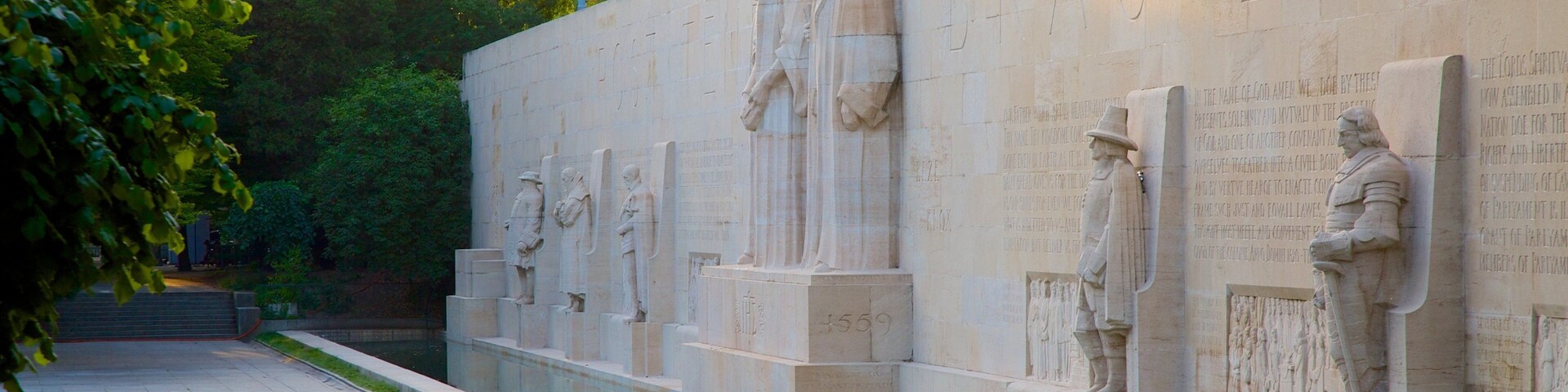 Reformation Wall Monument showing a monument and a statue or sculpture