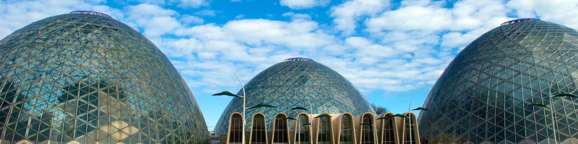 Mitchell Park Horticultural Conservatory which includes modern architecture and a park