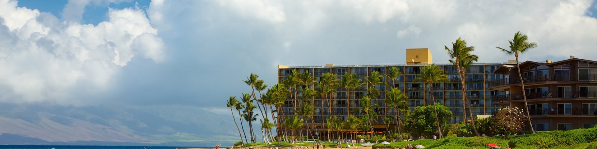 Keawakapu Beach which includes tropical scenes, general coastal views and a hotel