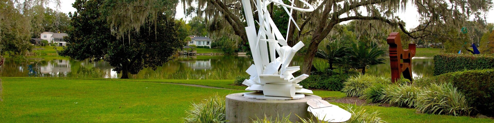 Loch Haven Park featuring outdoor art and a garden