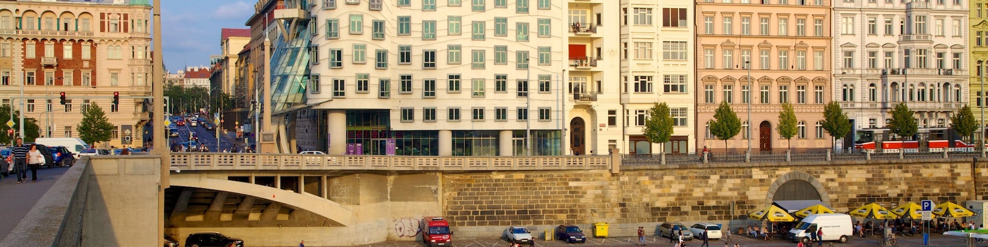 Prague Dancing House which includes modern architecture, heritage architecture and a bridge