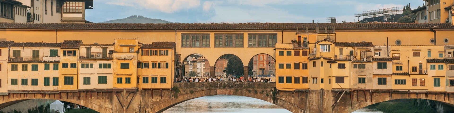 Ponte Vecchio showing a bridge and a river or creek