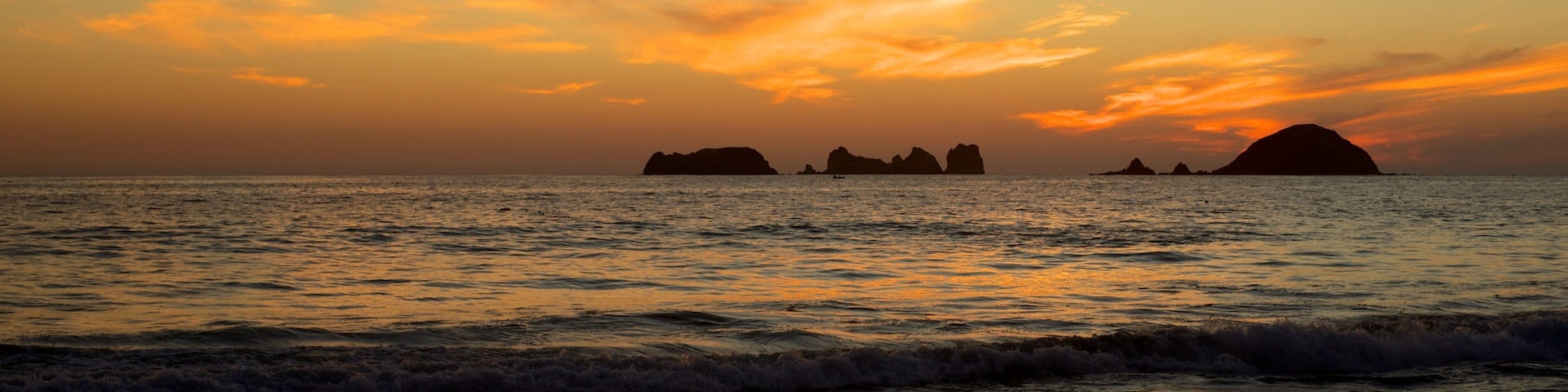 El Palmar Beach featuring a sunset, a beach and general coastal views