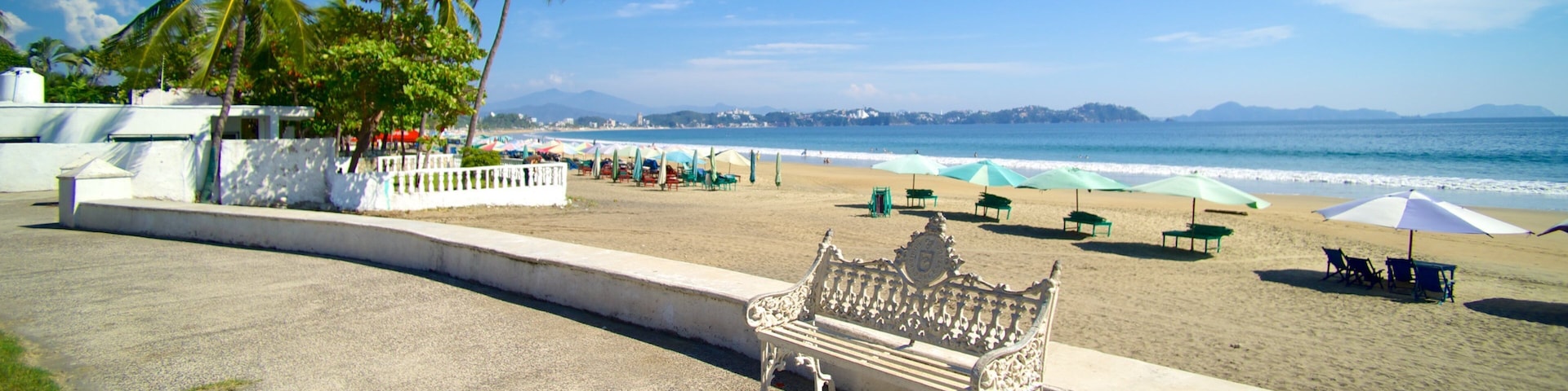 Playa Miramar which includes general coastal views and a beach