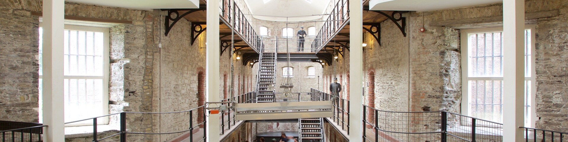 Cork City Gaol featuring interior views, an administrative buidling and heritage elements