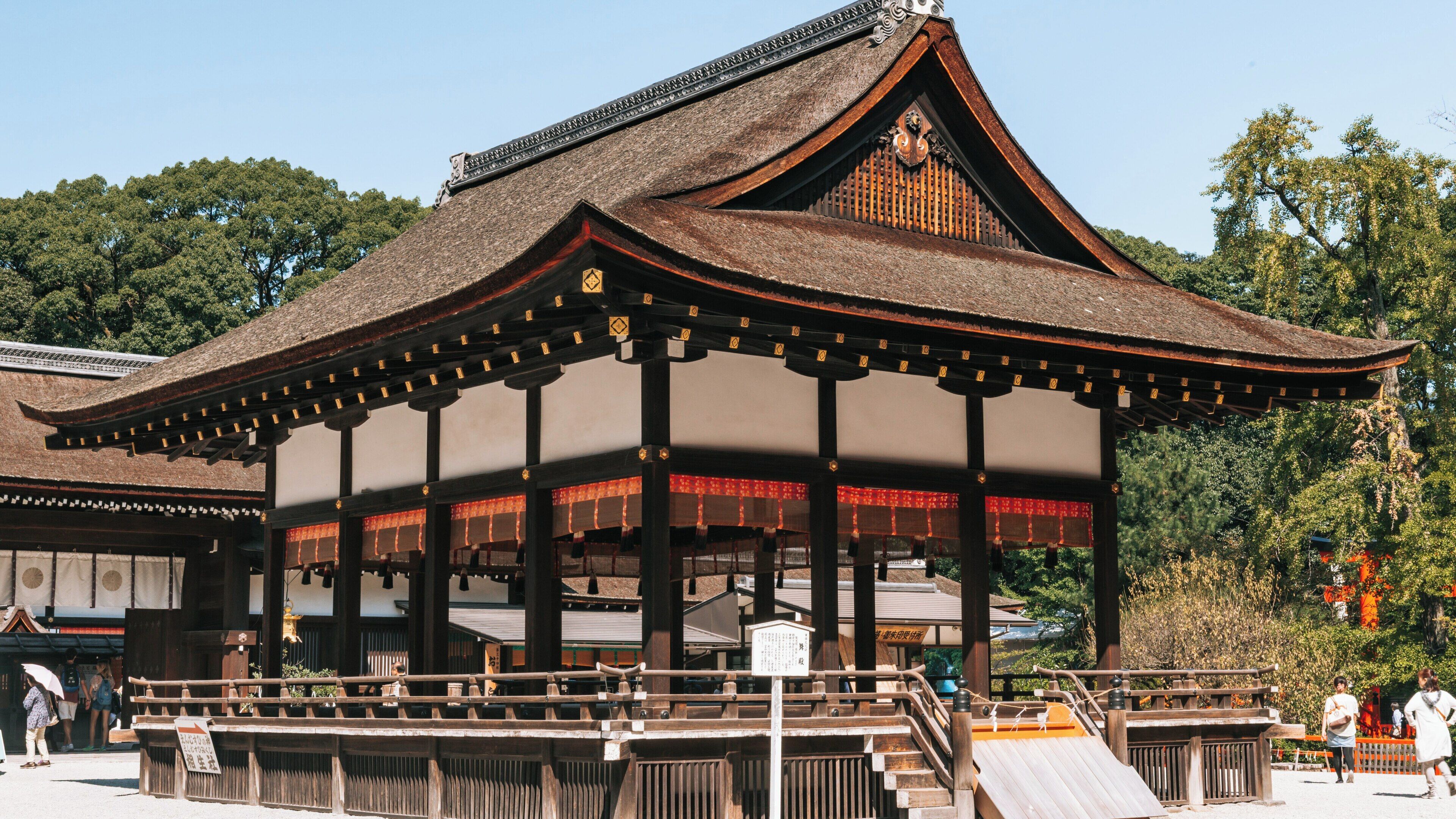 Experiencing the tranquility and beauty of Shimogamo Shrine in Sakyo Ward, Kyoto Prefecture, Japan during a serene afternoon
