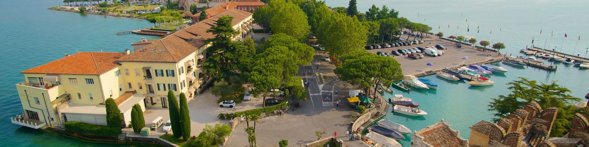 Scaliger Castle which includes a city and a lake or waterhole