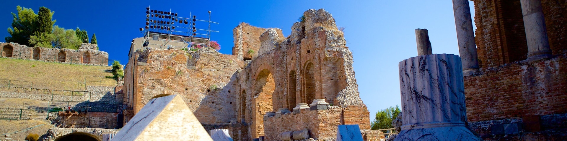 Greek Theatre which includes heritage architecture and a ruin