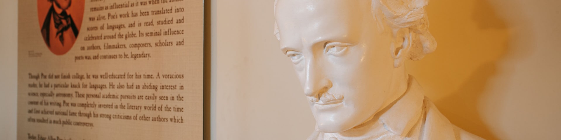 Edgar Allan Poe Museum and House showing a statue or sculpture