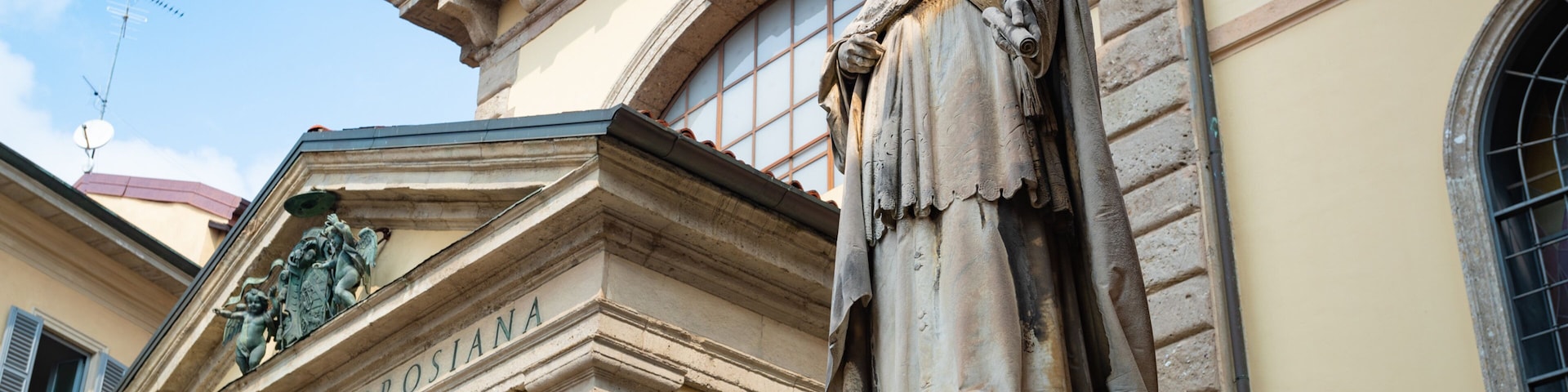 Ambrosian Library showing a statue or sculpture and heritage elements