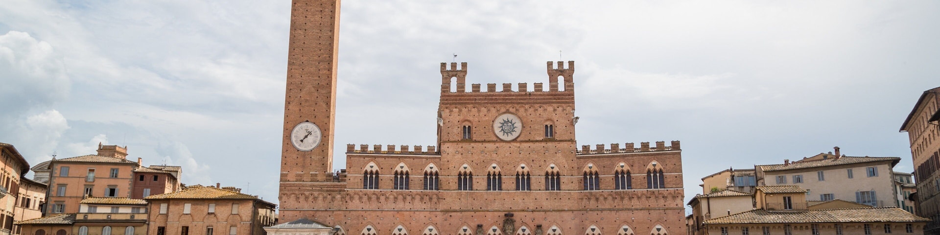 Piazza del Campo which includes a square or plaza and heritage architecture