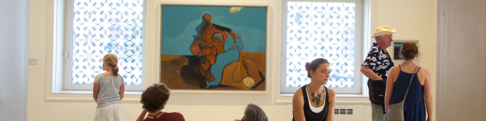 Peggy Guggenheim Museum which includes art and interior views as well as a small group of people