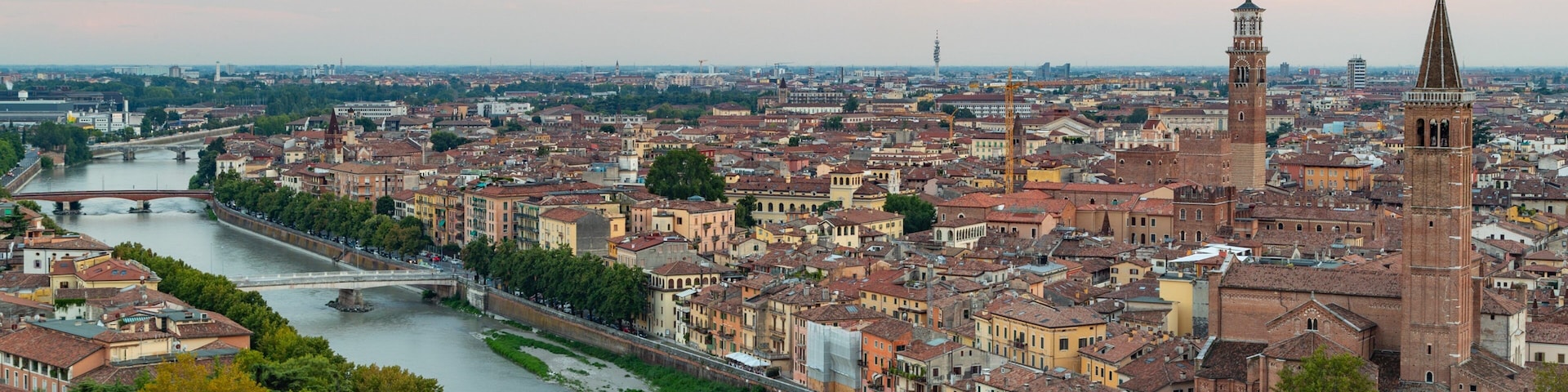 St. Peter\'s Castle featuring a river or creek, a city and a sunset