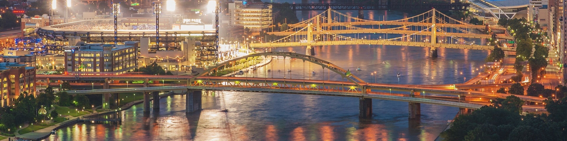 Point State Park which includes a river or creek, a city and night scenes