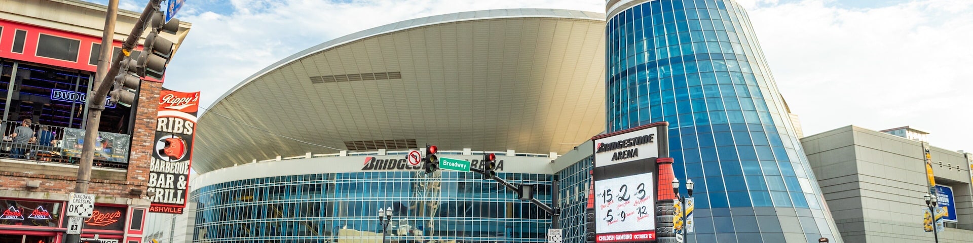 Bridgestone Arena showing modern architecture, street scenes and a city