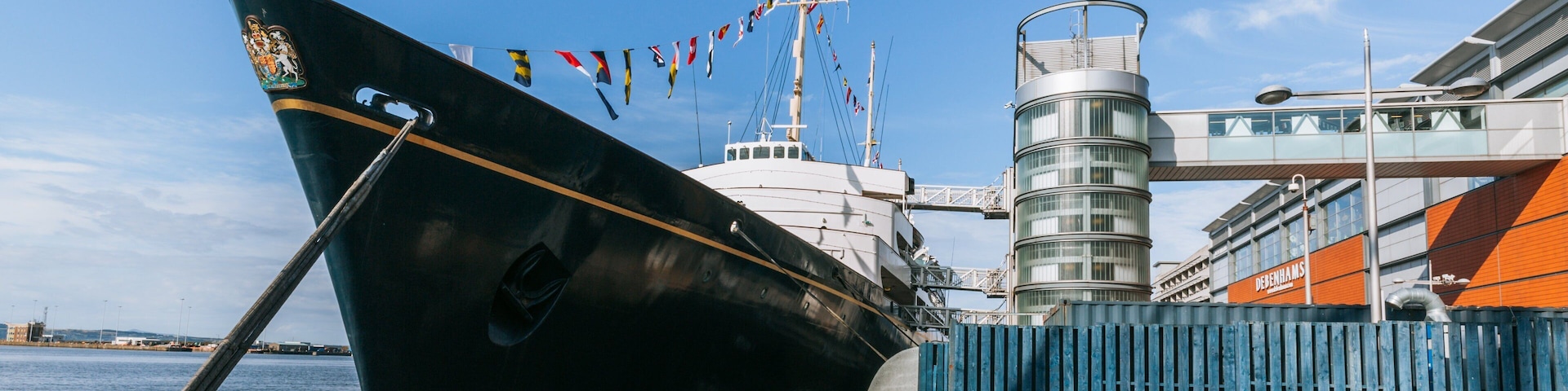 Royal Yacht Britannia featuring a marina