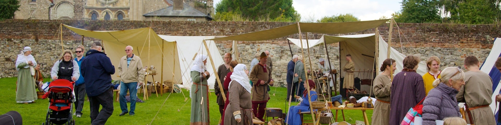 Waltham Abbey Church which includes a church or cathedral and religious elements as well as a large group of people