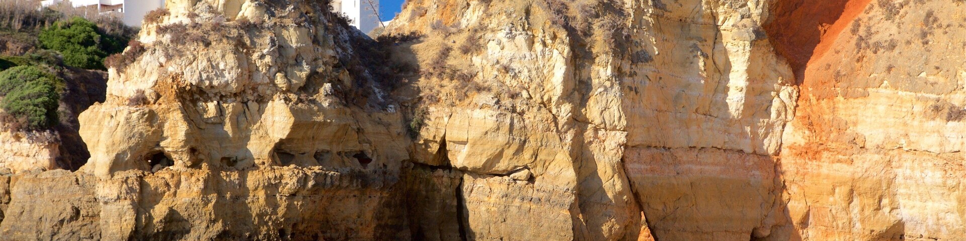 Batata Beach showing a beach, rocky coastline and general coastal views
