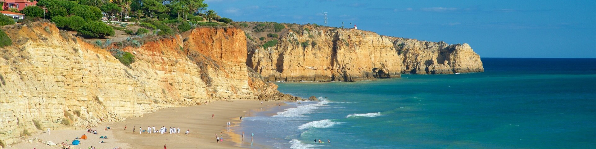 Praia do Porto de Mós mostrando paisagens litorâneas, uma praia e litoral acidentado