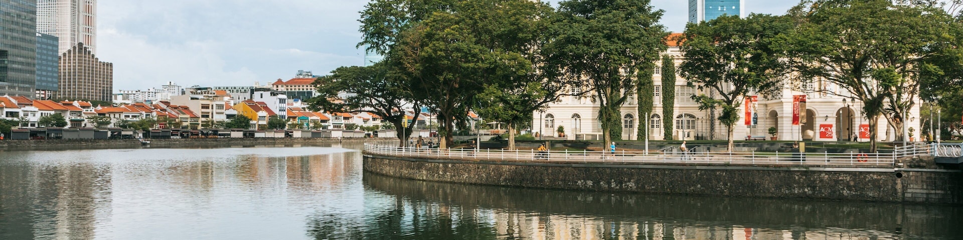Boat Quay showing a bay or harbor