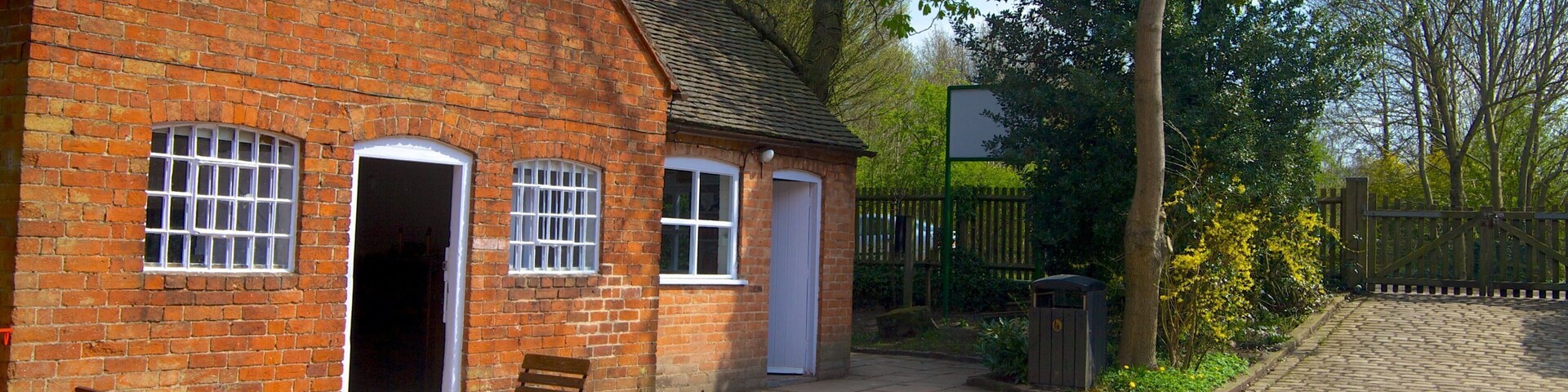 Sarehole Mill showing a city, heritage architecture and a house