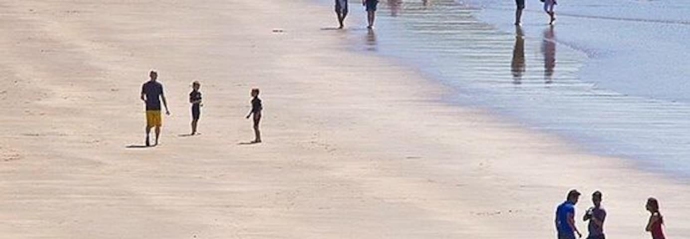 family walk along White Sands beach in St. davids, wales #waterlust