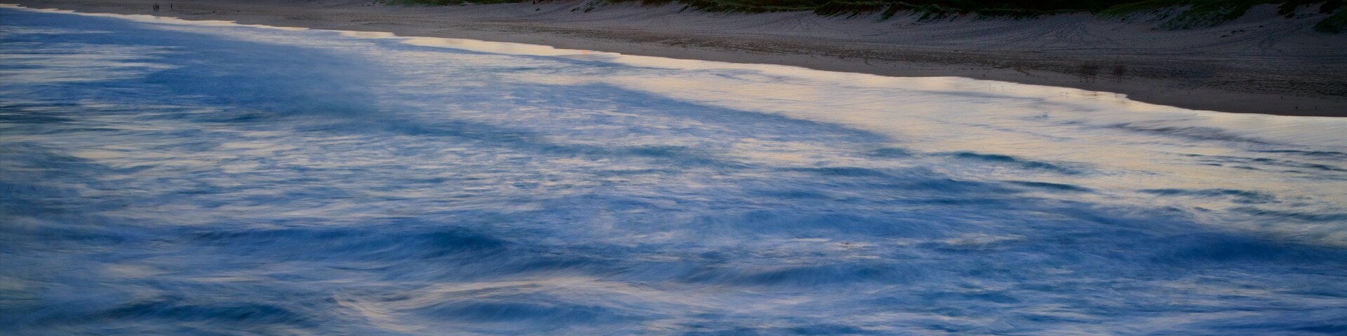 Wollongong South Beach featuring snow and a sunset