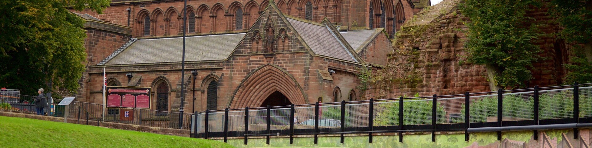 Roman Amphitheatre showing a church or cathedral, heritage architecture and a bridge