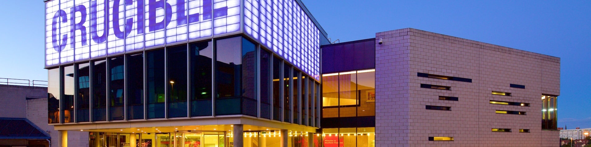 Crucible Theatre showing night scenes, modern architecture and theater scenes