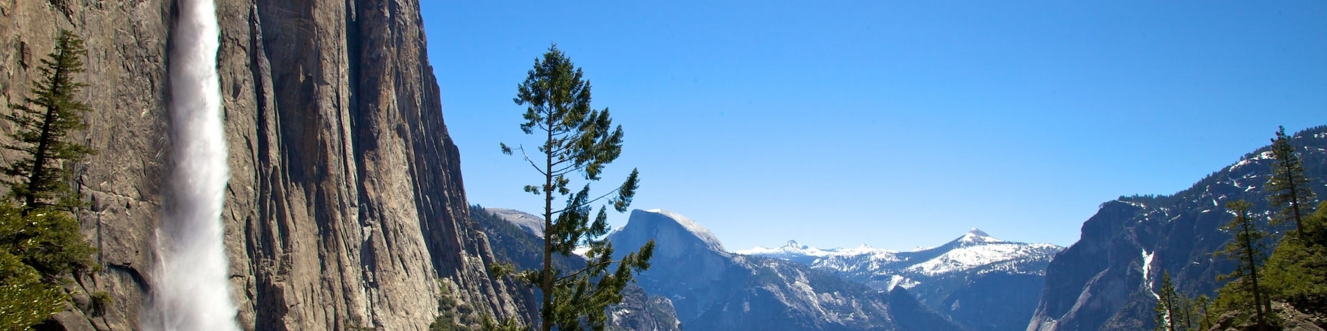 Yosemite Falls showing a waterfall and mountains