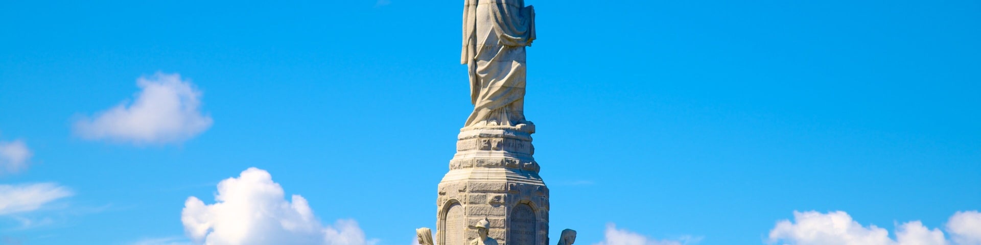 National Monument to the Forefathers showing a statue or sculpture