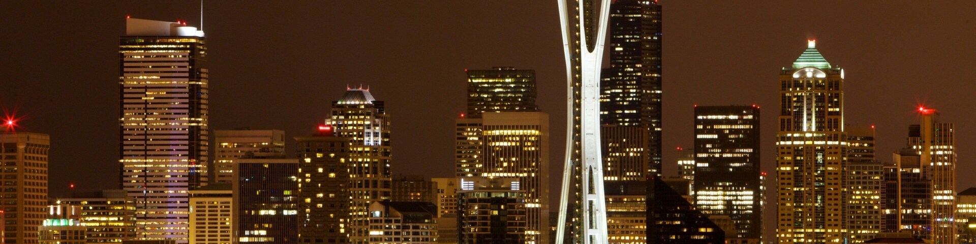 Stunning view of Seattle skyline illuminated at night with the Space Needle standing tall