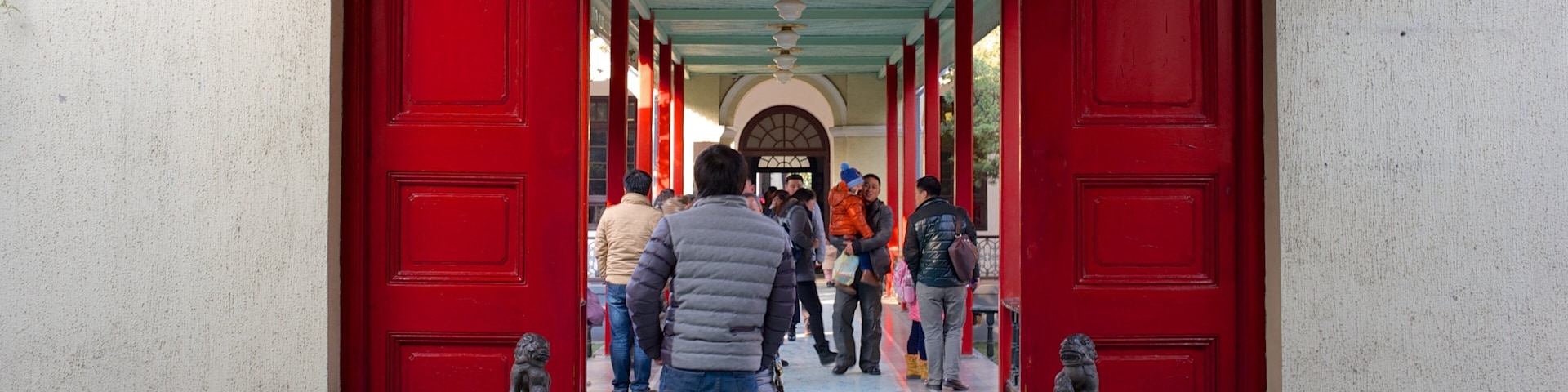 Nanjing Presidential Palace which includes chateau or palace and heritage architecture as well as a small group of people