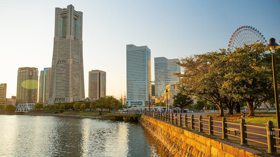 Landmark Tower which includes a city, a river or creek and a sunset