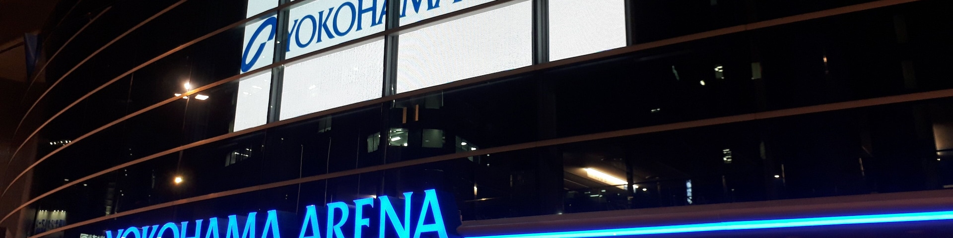 Yokohama Arena showing night scenes and signage
