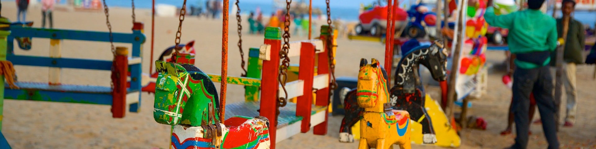 Elliot\'s Beach which includes a playground and a beach