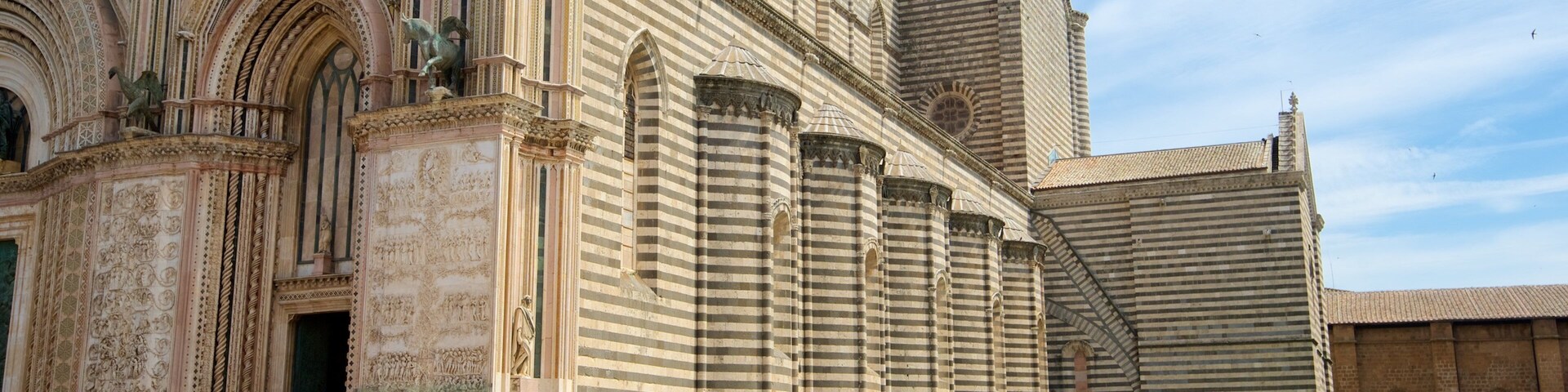 Duomo di Orvieto featuring religious elements, a church or cathedral and heritage architecture