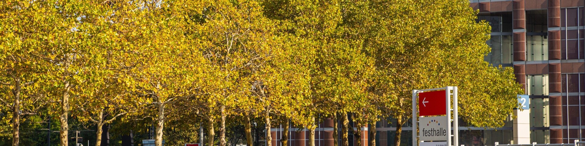 Festhalle Frankfurt featuring signage and a square or plaza