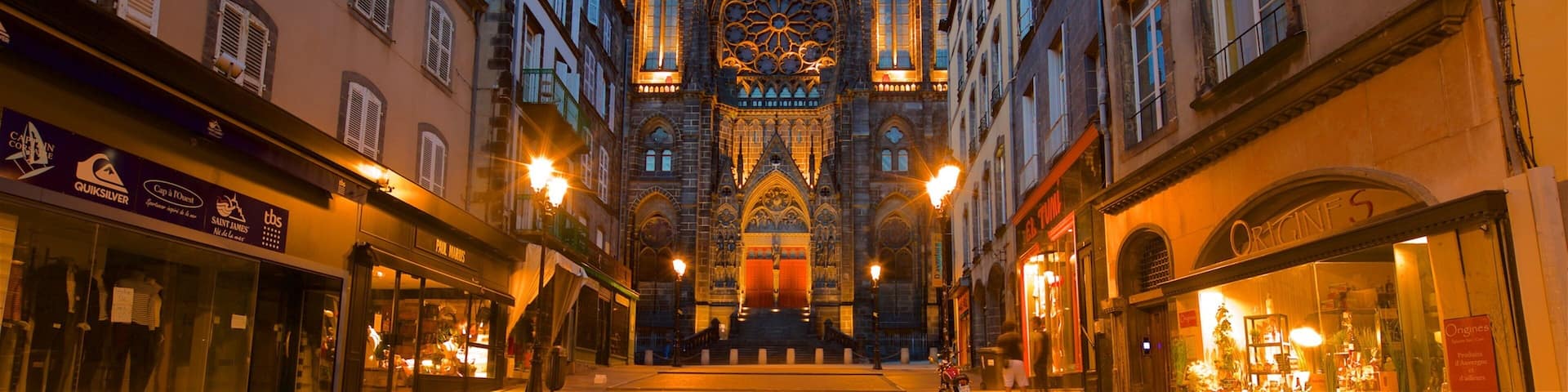 Clermont-Ferrand Cathedral which includes night scenes, a city and heritage architecture
