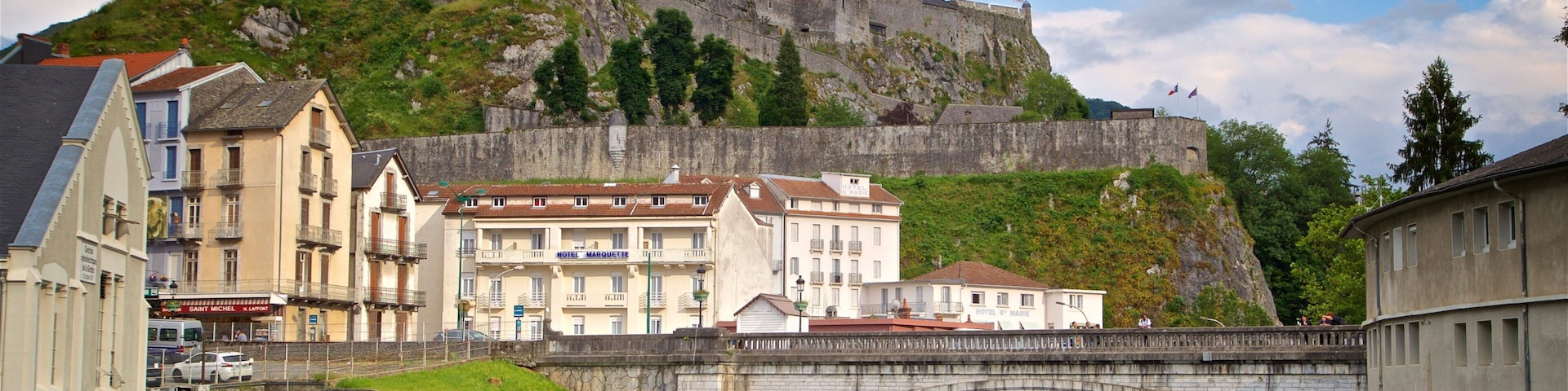 Chateau Fort Pyreneen Museum showing heritage architecture, a river or creek and a bridge