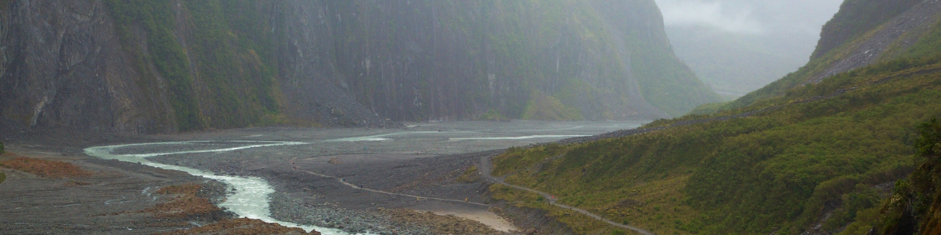 Fox Glacier showing a river or creek, mist or fog and mountains