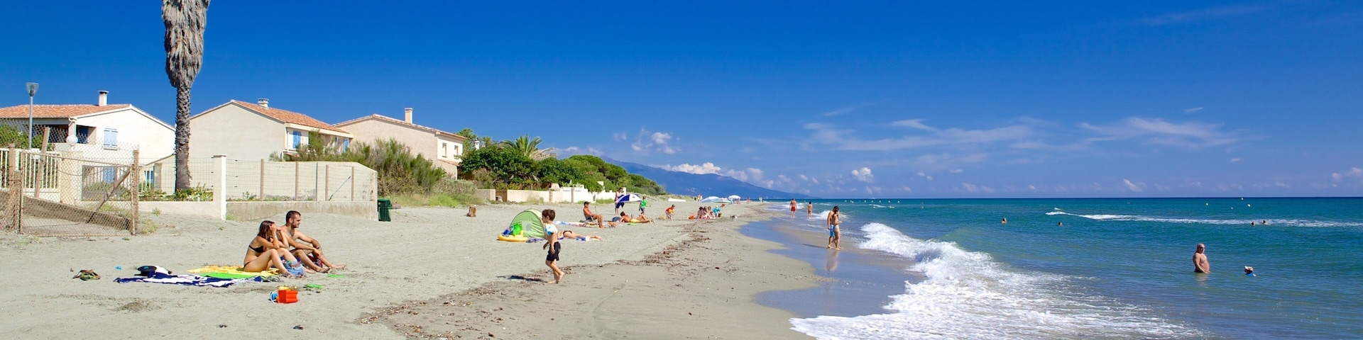 La Marana Beach which includes a sandy beach and general coastal views