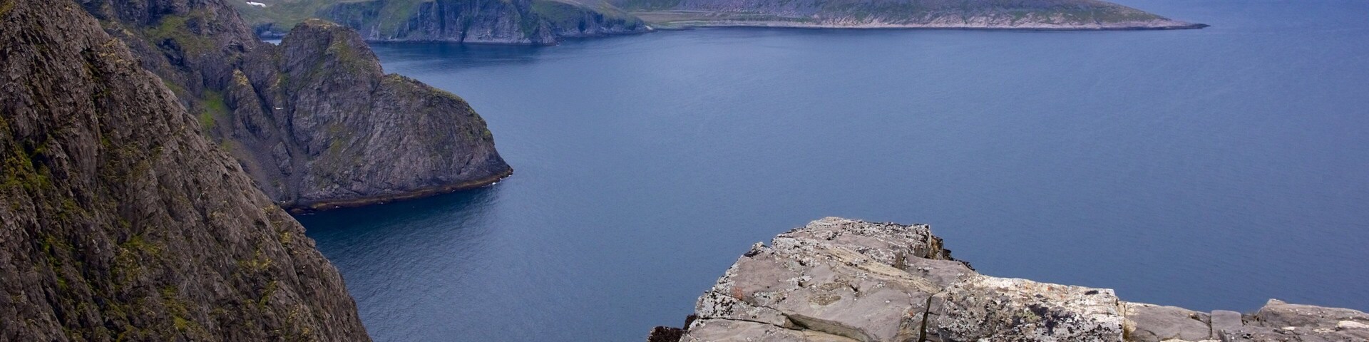 Knivskjellodden which includes landscape views, mountains and general coastal views