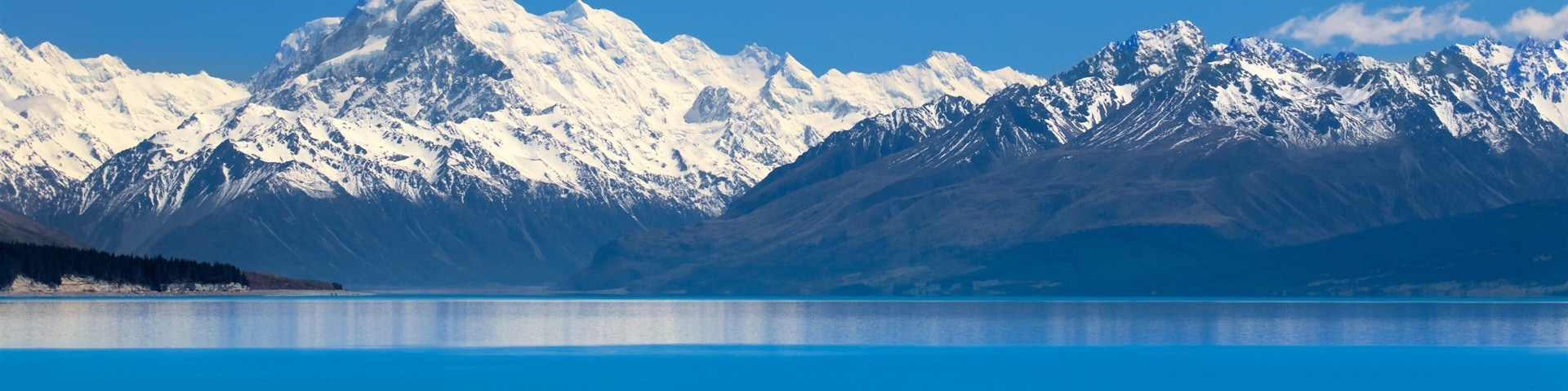 Lake Pukaki que inclui neve, montanhas e um lago ou charco