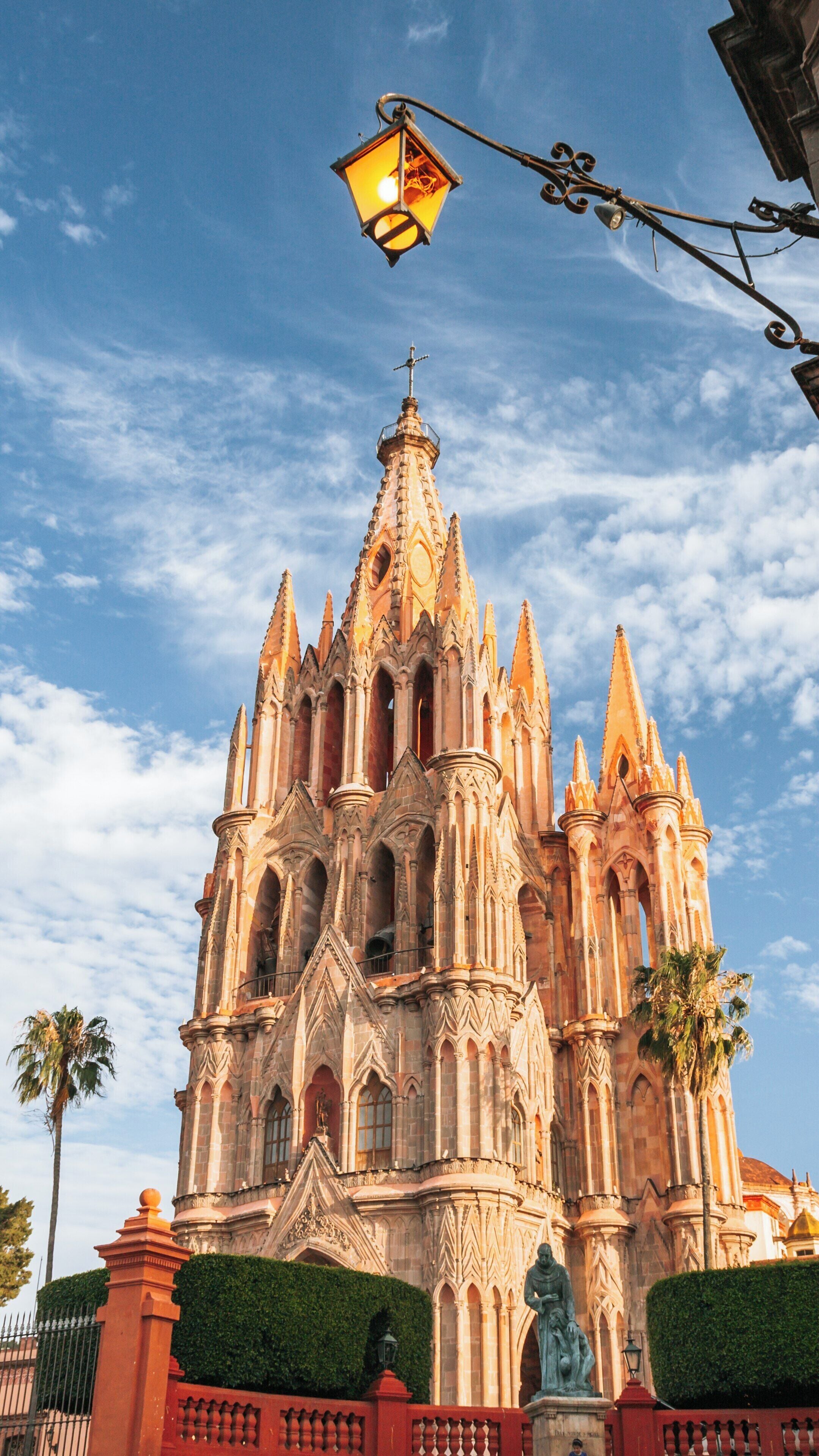 Explore the architectural beauty of Church of San Miguel Arcángel in San Miguel de Allende, Guanajuato, showcasing stunning Gothic revival design under a vibrant sky