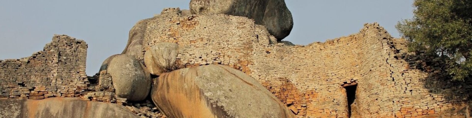 Close to the small city Masvingo in Zimbabwe you find the origin to the name Zimbabwe got in 1980. The name was already used by african nationalists around 1960 as a possible name for the country the day they got their freedom. The name comes from shona language and means ruins. In 1986 this amazing place was proclaimed a Unesco World Heritage Site. This is an amazing place and a must visit if you are in Zimbabwe.
Read more at: http://www.travelwithallsenses.com/great-zimbabwe-unesco-world-heritage-site/