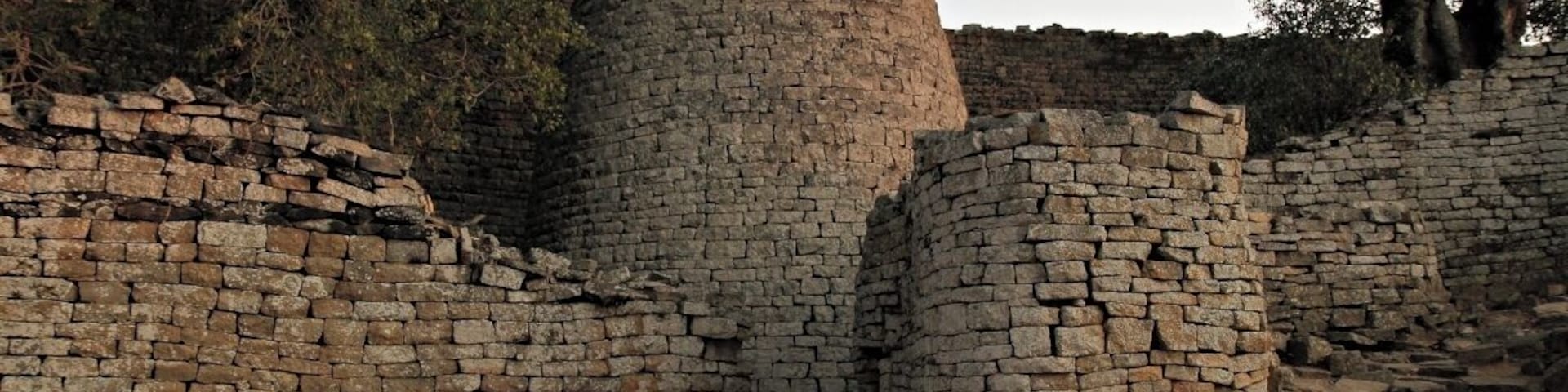 Close to the small city Masvingo in Zimbabwe you find the origin to the name Zimbabwe got in 1980. The name was already used by african nationalists around 1960 as a possible name for the country the day they got their freedom. The name comes from shona language and means ruins. In 1986 this amazing place was proclaimed a Unesco World Heritage Site. This is an amazing place and a must visit if you are in Zimbabwe.
Read more at: http://www.travelwithallsenses.com/great-zimbabwe-unesco-world-heritage-site/