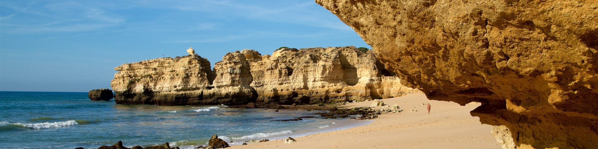 Sao Rafael Beach which includes general coastal views, rocky coastline and a beach