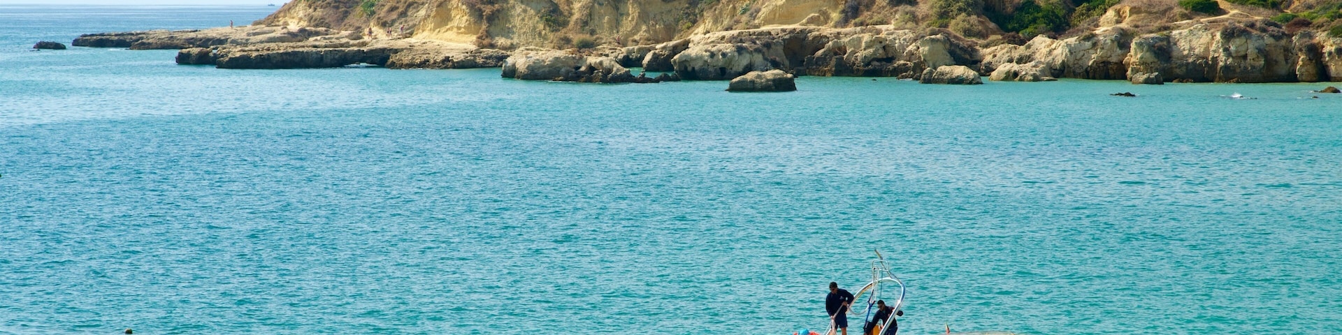 Praia da Oura caracterizando paisagens litorâneas, canoagem e litoral acidentado